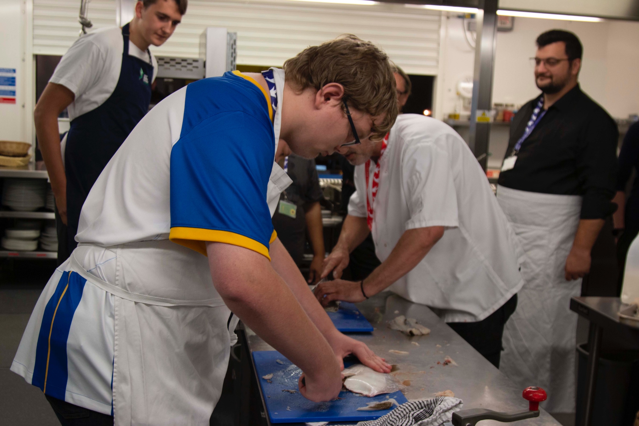 Alumnus speaks to students at cookery demonstration in partnership with ...